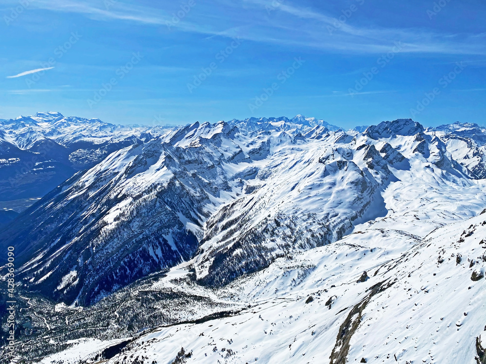 Spring icy alpine atmosphere on the Swiss mountain peaks viewed from ...