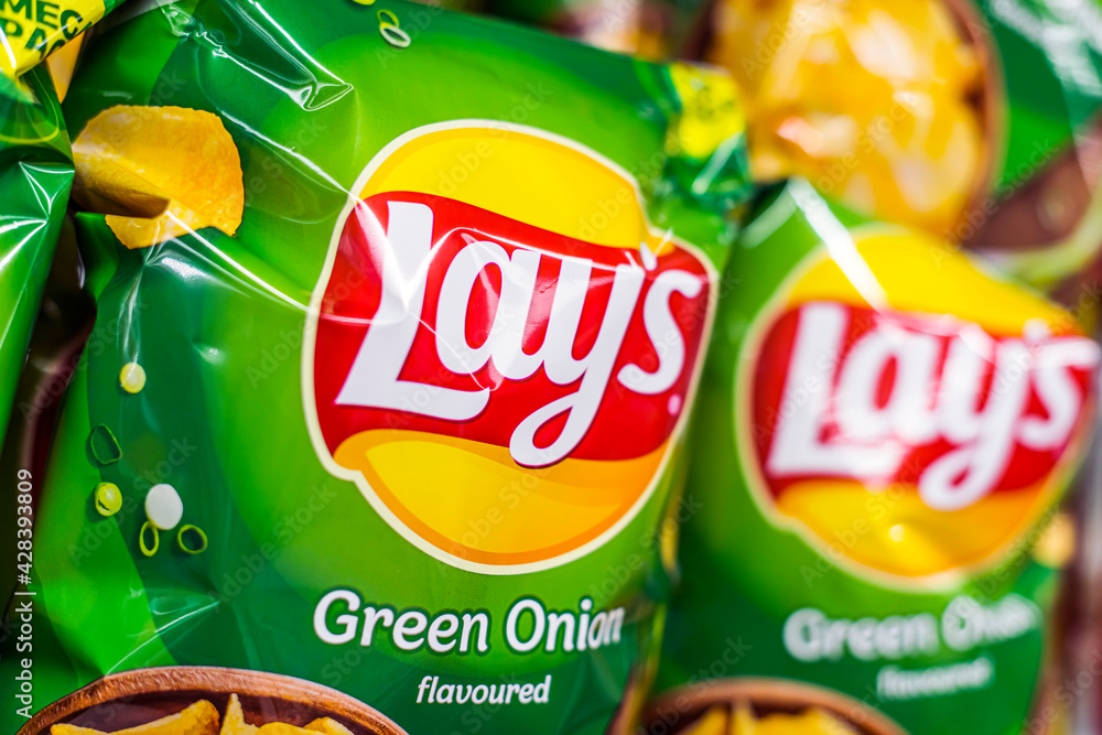Packets of Lays potato chips in supermarket Stock Photo | Adobe Stock