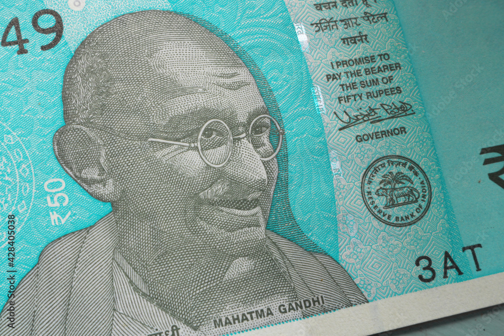 Portrait of Mahatma Gandhi on a new banknote 500 rupees. Gandhi's face ...