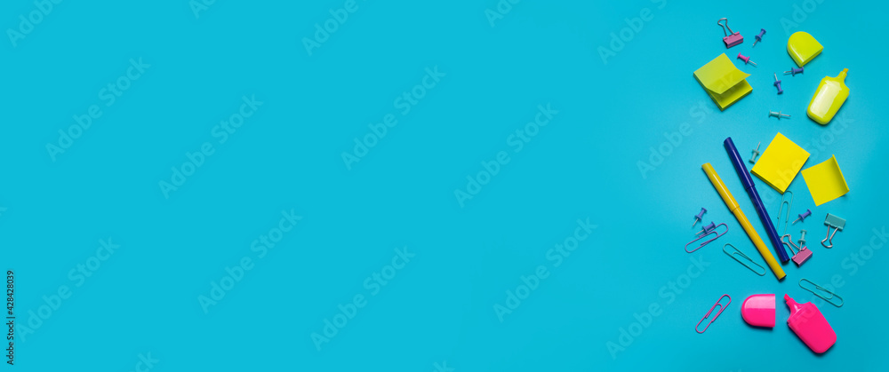 Stationery items on the blue background with free space for text ...
