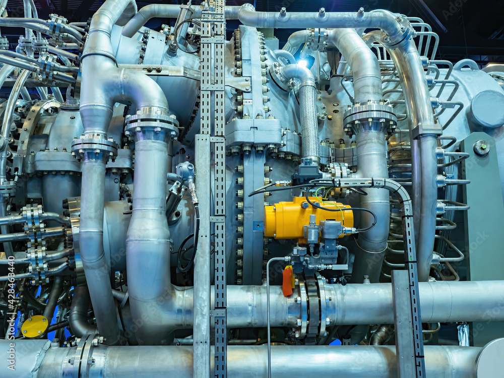 Installation with many small pipes in a chemical plant. Compressor at a ...