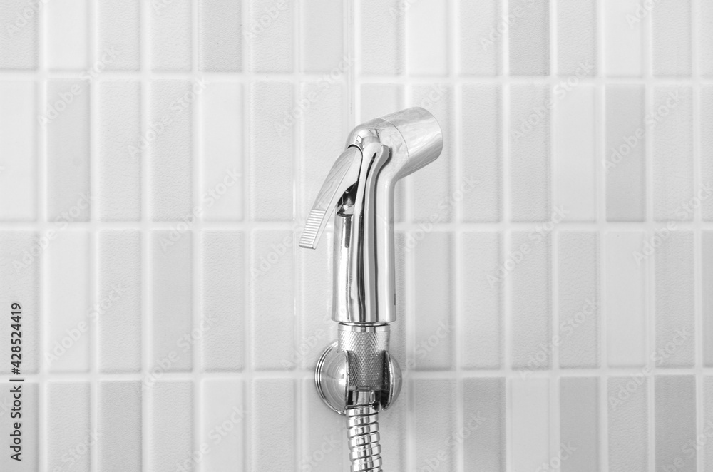 sanitary ware on white wall background in toilet Stock Photo | Adobe Stock