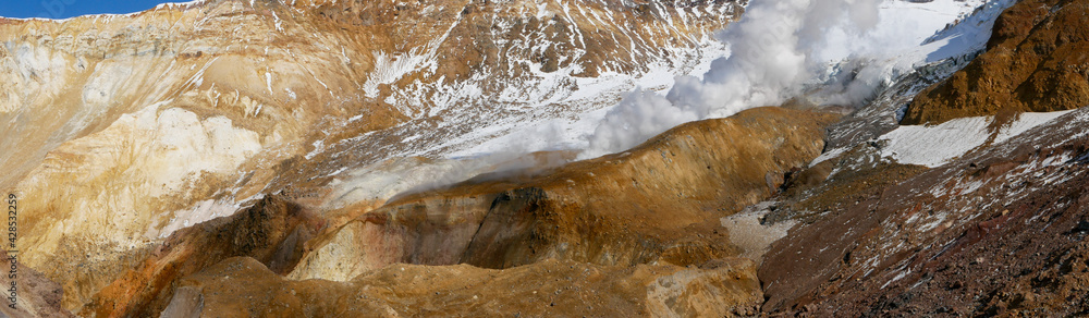 Panorama view of the snow-capped mountains of the Mutnovsky volcano and ...