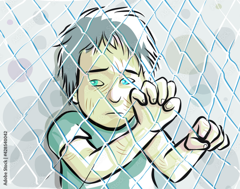 The little boy was standing and hold the cage with a face of a ...