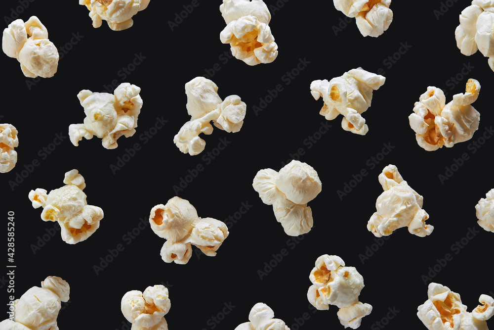 Popcorn on black background Stock Photo | Adobe Stock