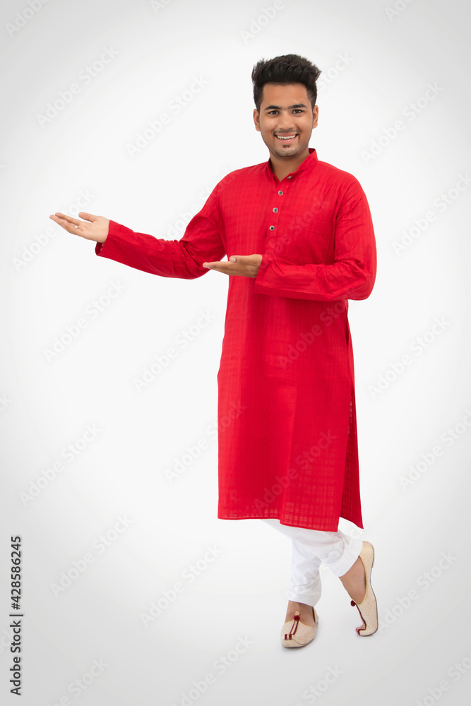 Indian man indicating with hands, copy space Stock Photo | Adobe Stock