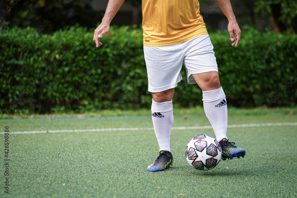 Bangkok, Thailand - April 2021: A football player who is wear Adidas ...