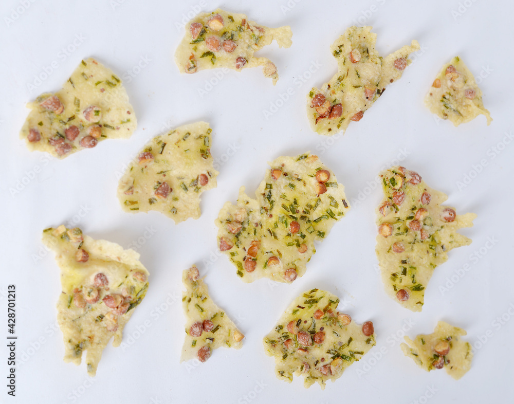 Peyek Kacang or peanut rempeyek in white background. Deep fried savoury ...
