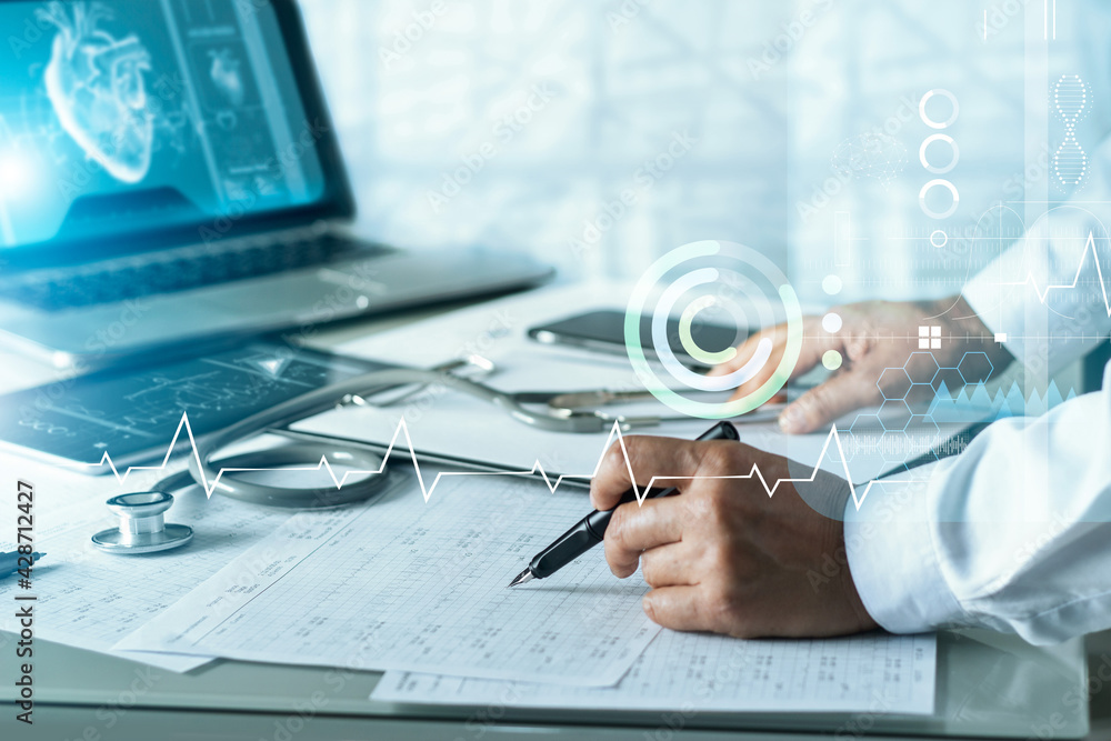 Senior cardiologist doctor analysis and diagnose checking heart disease ...