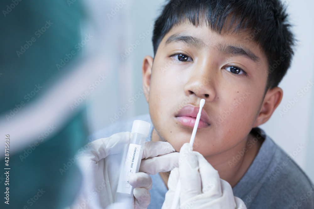 Doctor taking a swab for corona virus sample from potentially infected ...