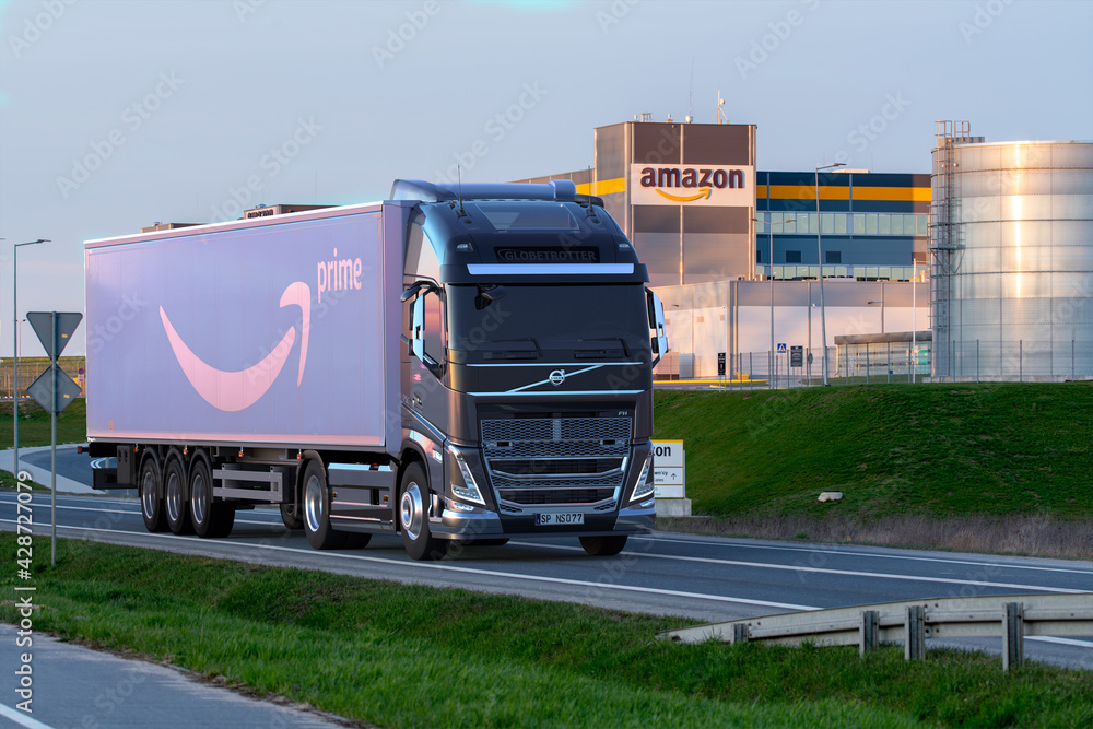 truck with a semi-trailer with the Amazon logo going to Amazon's ...