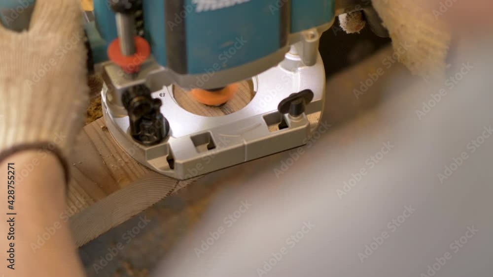 Carpenter using plunge router with electrical brake and twin LED light ...