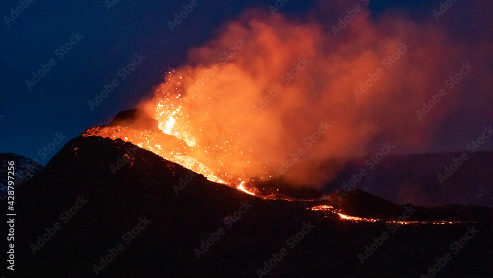 GELDINGADALUR, ICELAND. Erupting Fagradalsfjall volcano at night, 52 km ...