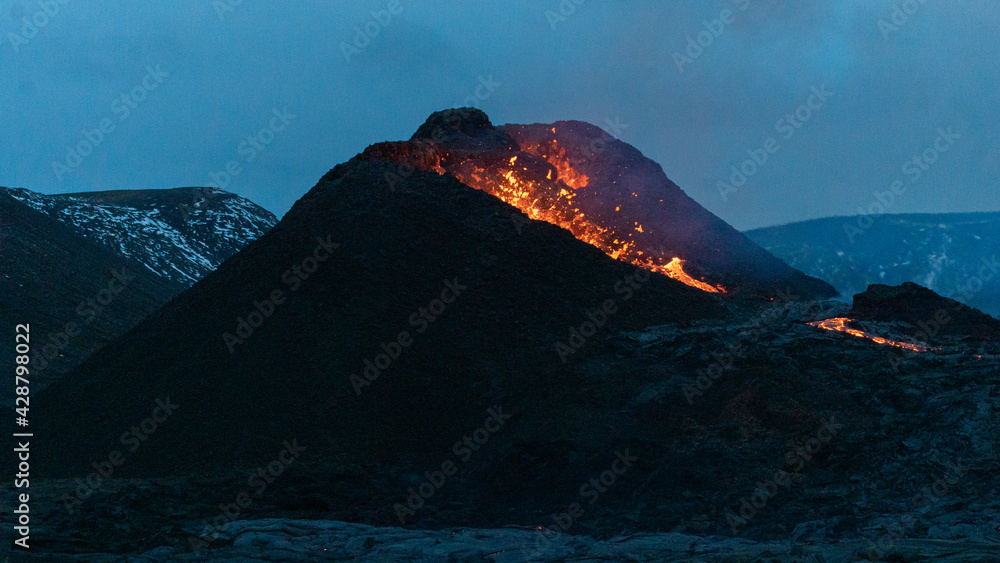 GELDINGADALUR, ICELAND. Erupting Fagradalsfjall volcano at night, 52 km ...