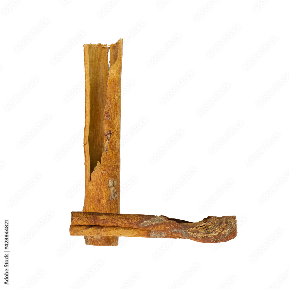 Cinnamon font. Letter L is made from pieces of cinnamon on white ...