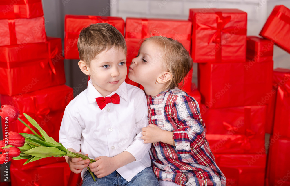 Cute couple of kids kissing each other. Romantic meeting of two ...