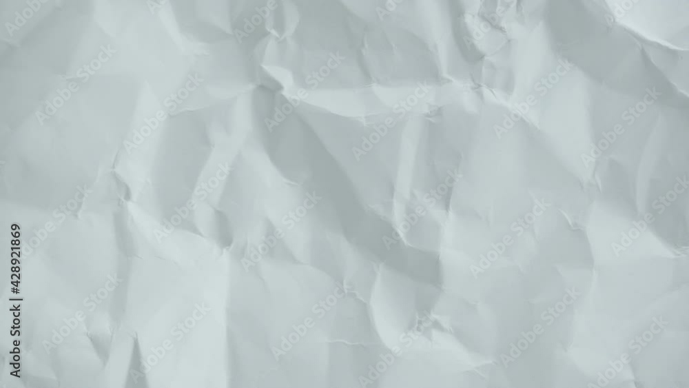 Crumpled sheet of paper. Live wallpaper abstract background. Slow ...