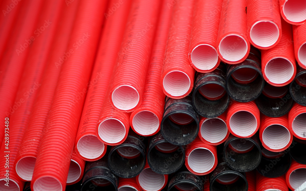 PVC pipes of various colors on the construction site Stock Photo ...