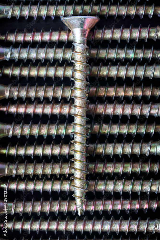 One golden brass galvanized with tint steel wood tapping screw over ...