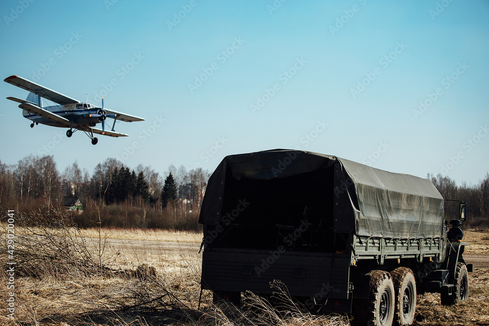 dangerous flight of a sports plane over the heads of people. a ...