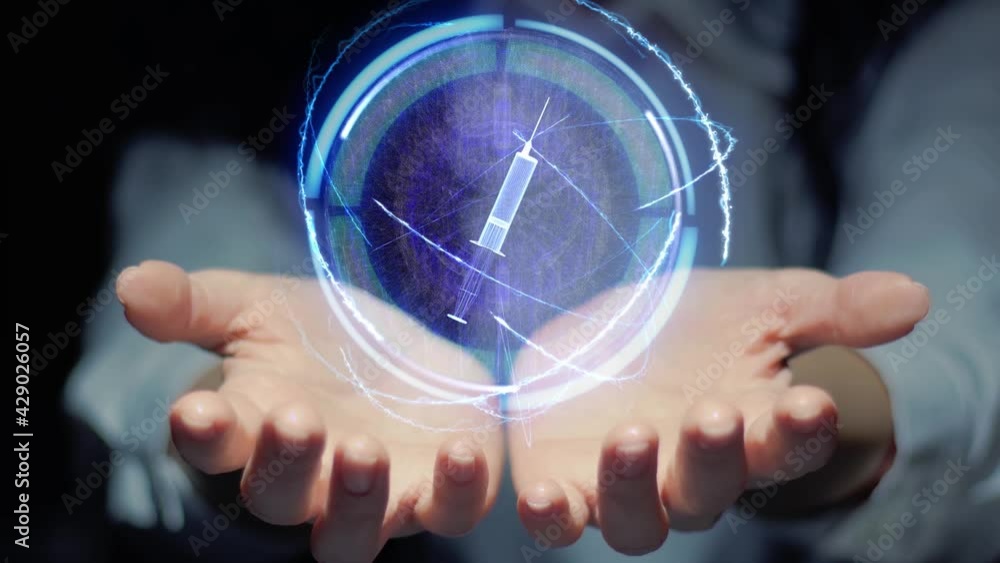 Female hands show a round conceptual hologram with particle syringe ...