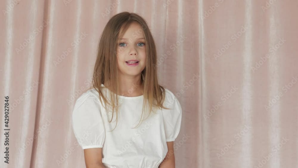 Girl kid presentation. Cute little girl smiling looking at camera at ...