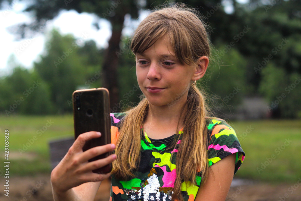 Defocus Ten Year Old Girl Find Something On Smart Phone Beautiful
