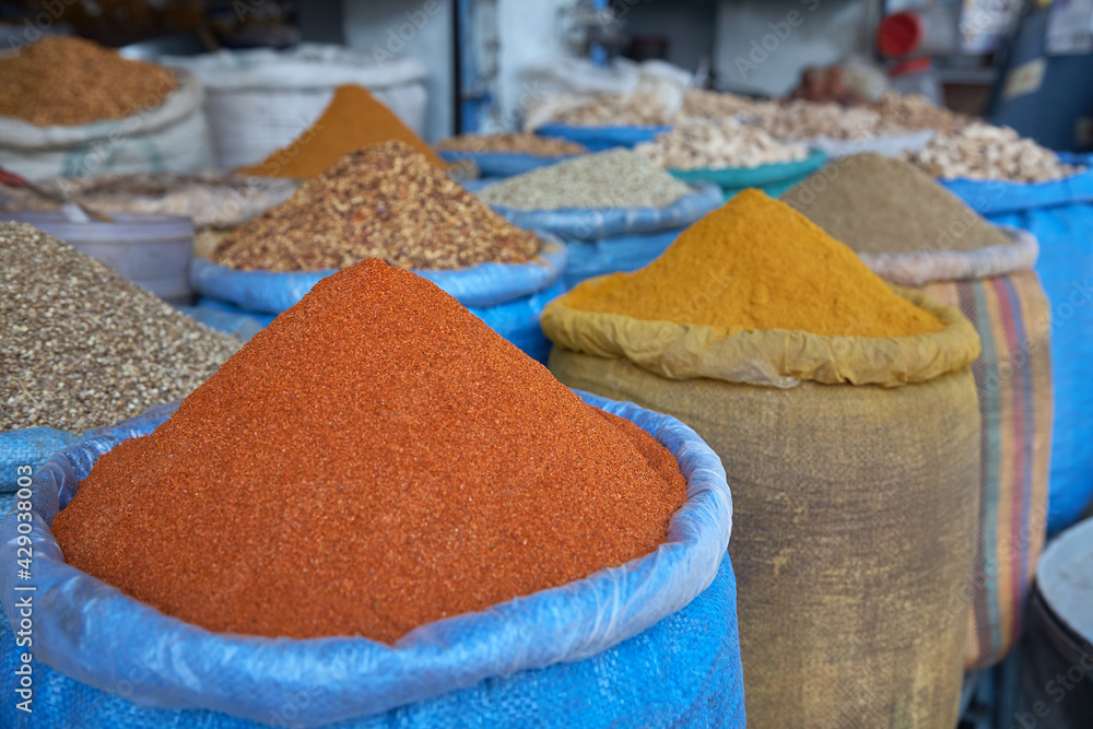 Chilly in the foreground sharp. Turmeric/yellow root slightly out of ...