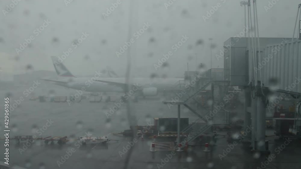 Delayed flight due to weather. Hurricane, fog and flood in the airport ...