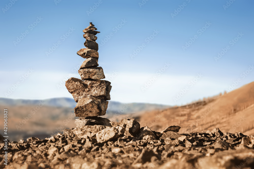 pyramid of stones stacked on top of each other against the background ...