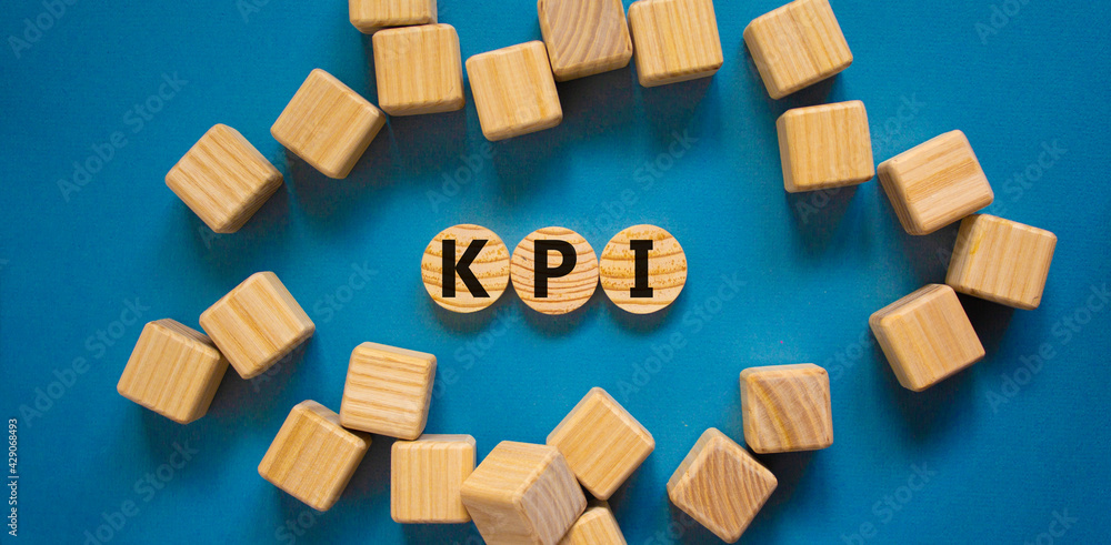 KPI, key performance indicator symbol. Wooden circles with word 'KPI ...