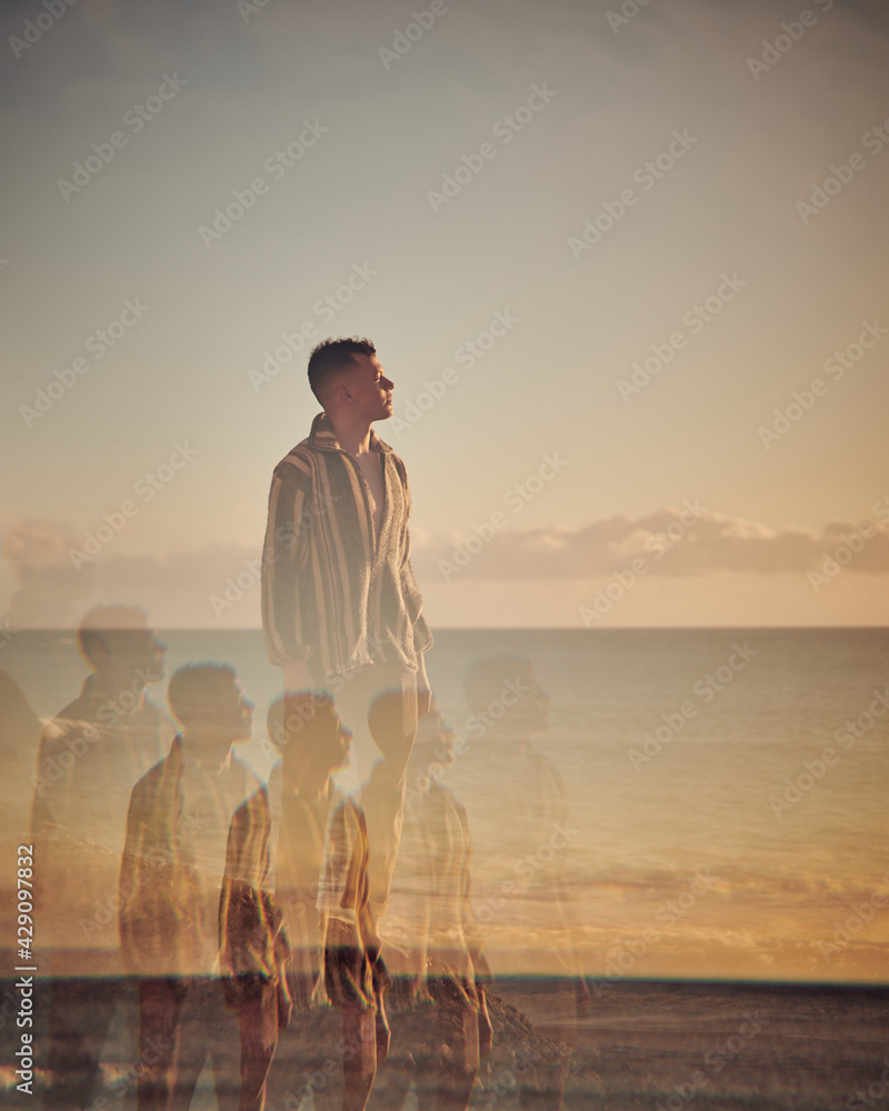 reflective person at the beach at sunset Stock Photo | Adobe Stock