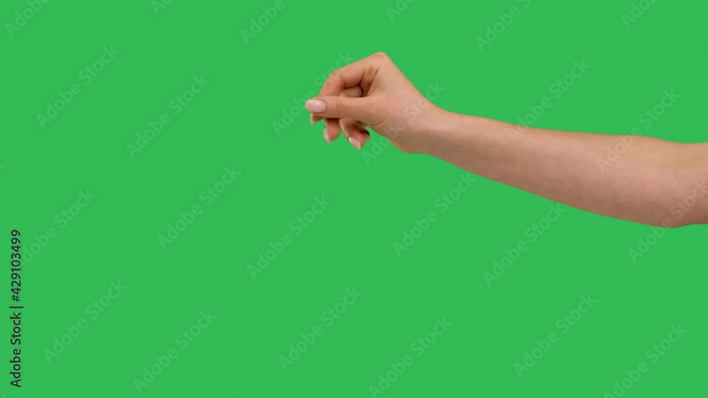 Close up side view of beautiful outstretched female hand with a ...