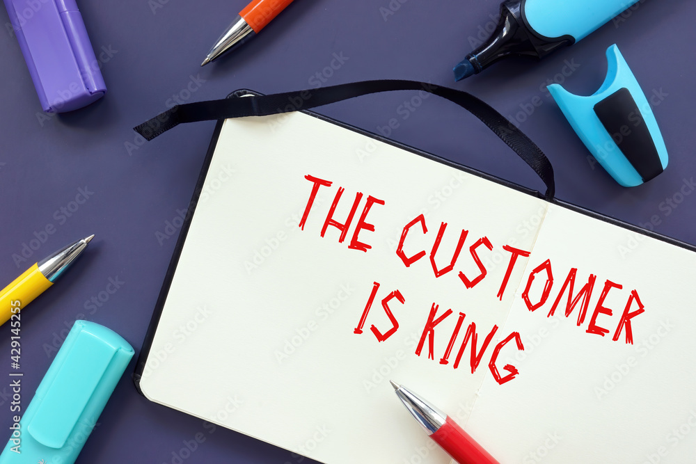 Business concept about The Customer Is King with sign on the piece of ...