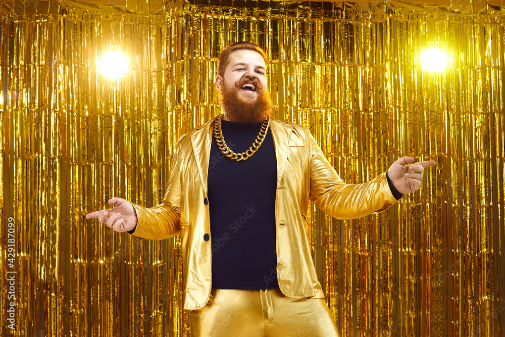 Happy chubby guy having fun at concert or disco party. Rich young man ...