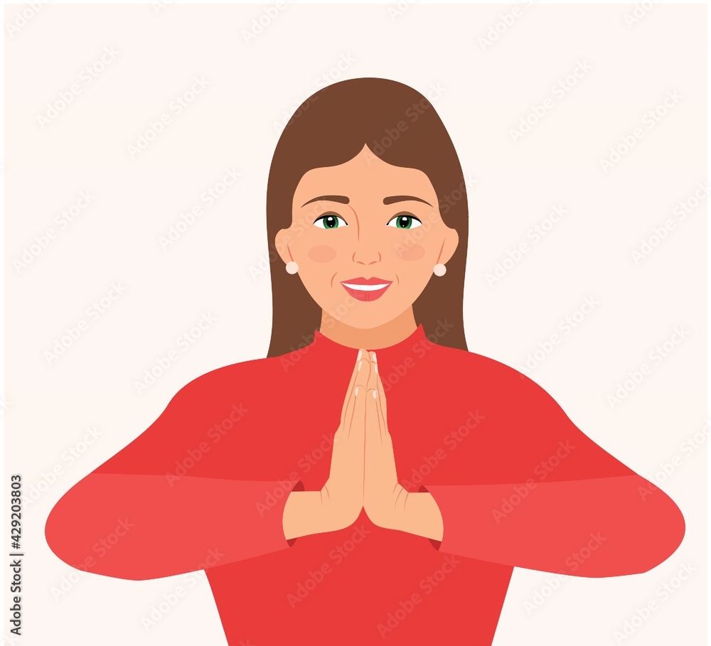 Happy beautiful young woman with welcome gesture of hands. Namaste ...