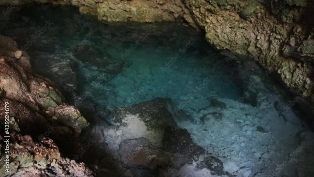 Cave with fresh water, Zanzibar. Kuza Cave. Underground river cave ...