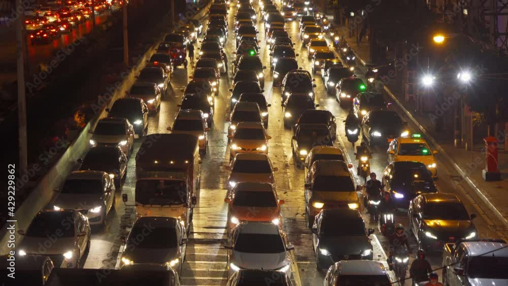 Crowd of busy cars with heavy traffic jam in rush hour on highway road ...