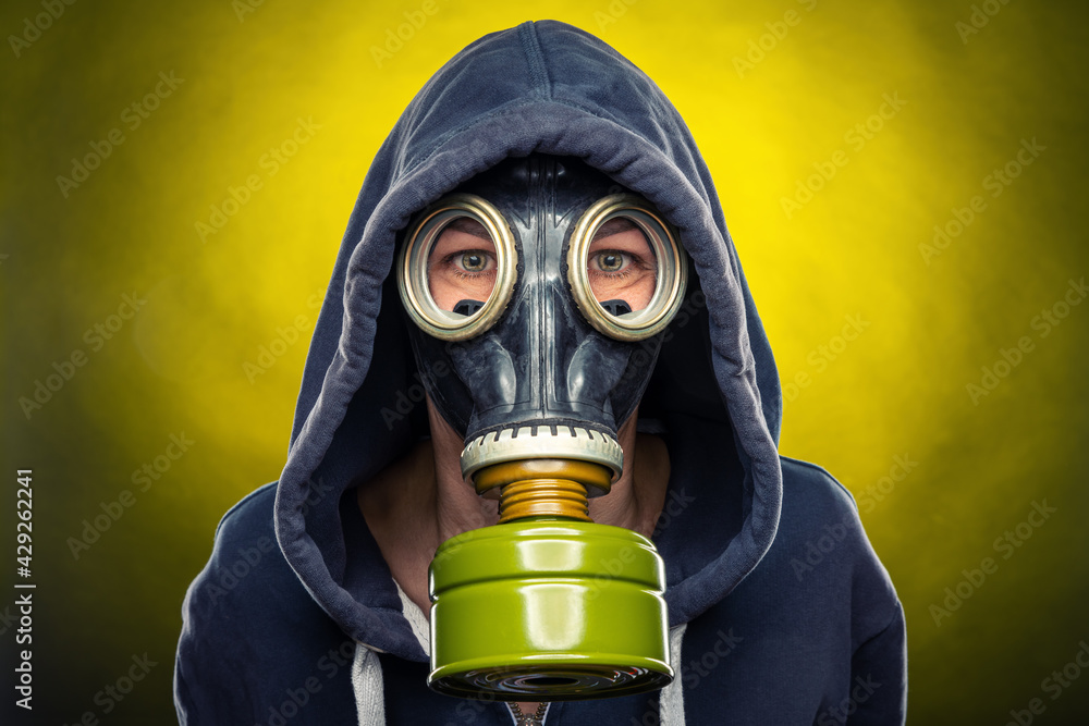 woman wearing a gas mask Stock Photo | Adobe Stock