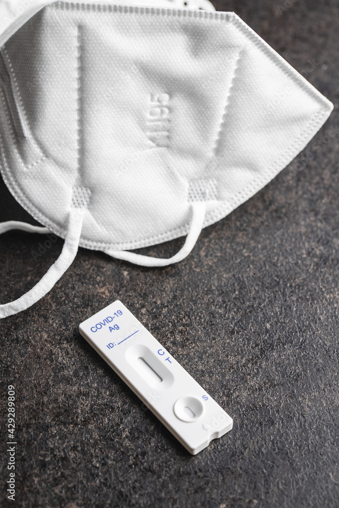 Covid-19 rapid antigen test. Rapid antibodies test kit and KN95 ...