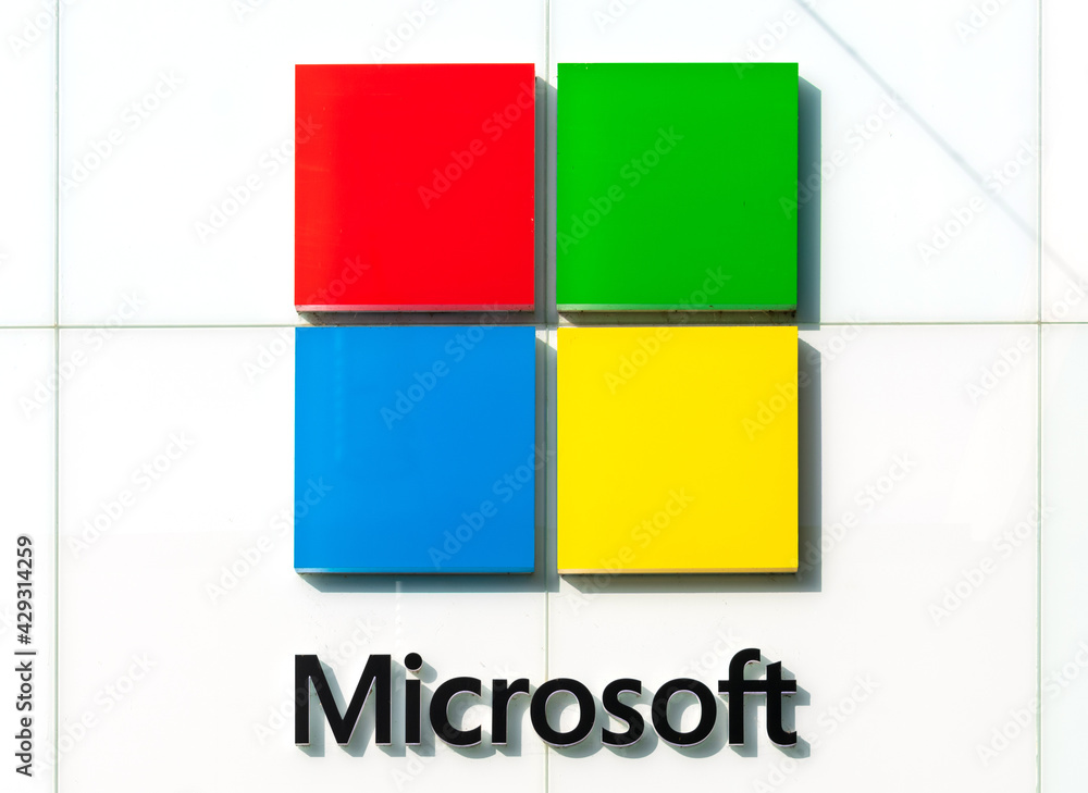 Microsoft logo with four color squares on building facade. Microsoft ...