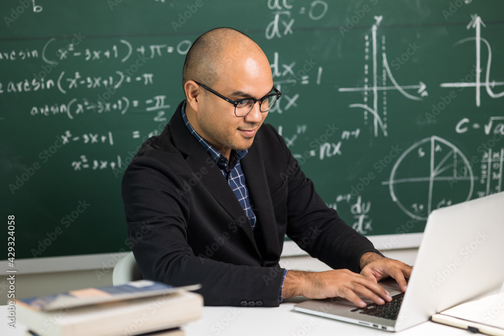 Indian young teacher man sitting teaching online video conference live ...