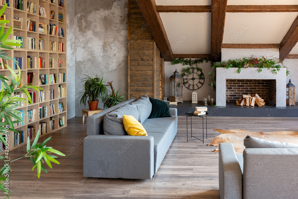 Dark loft style interior of big cozy country house. open plan apartment ...