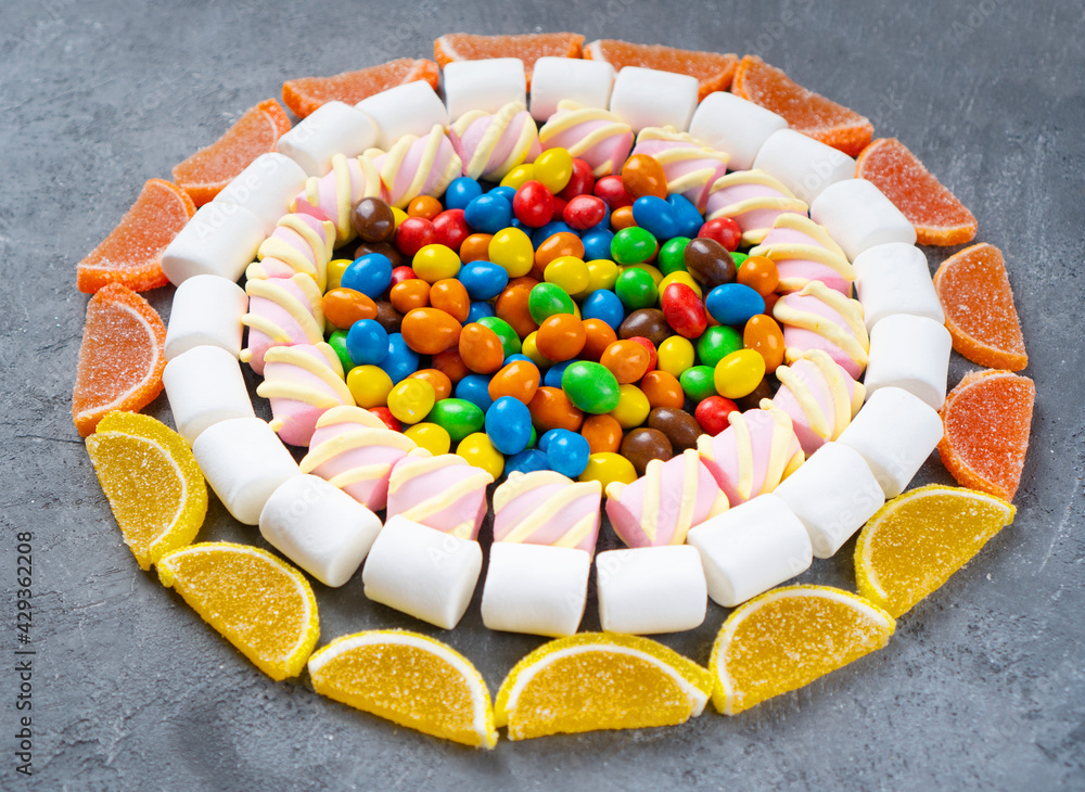 Sweets and candies background. Sweets lay folded in a circle. Stock ...