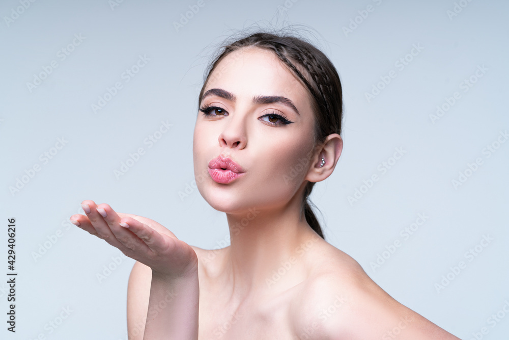 Kiss. Portrait of cute lovely girl sending blowing kiss with pout lips ...