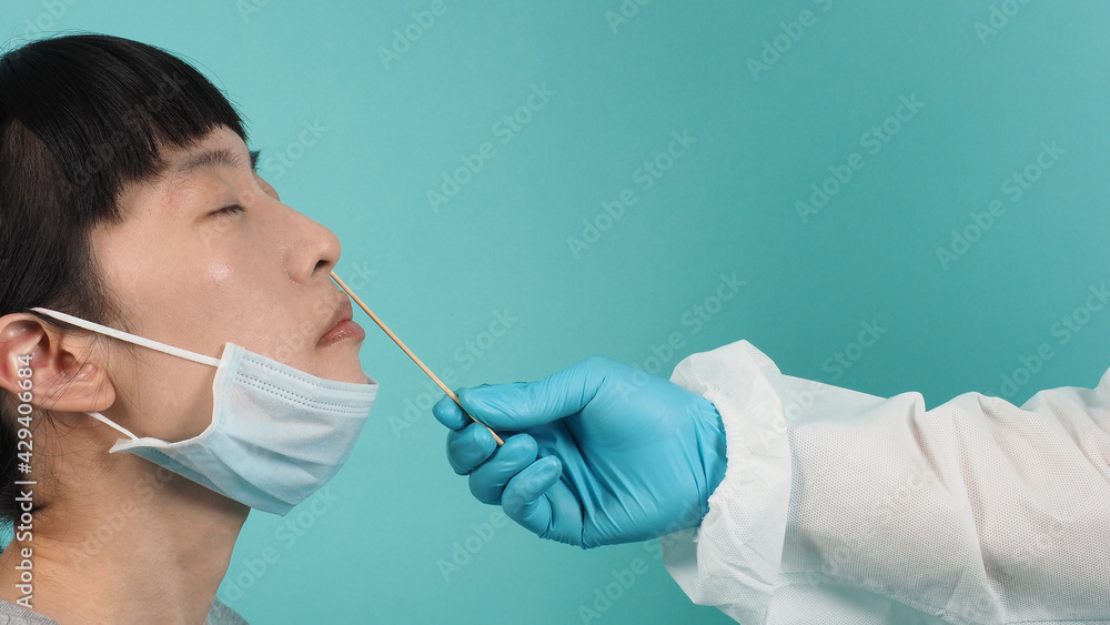 Covid 19 swab test. woman with PCR test. Coronavirus test during ...