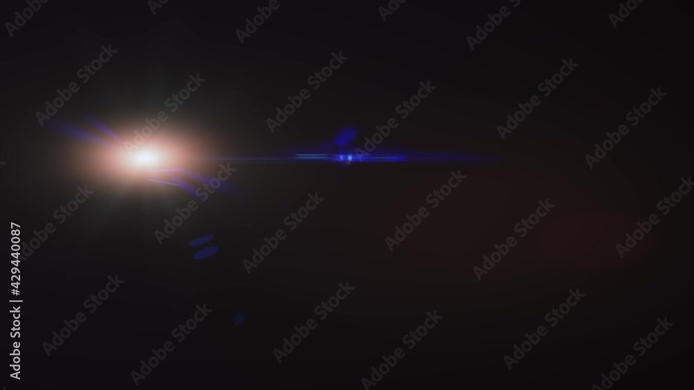 Aspherical lens flare glowing isolated on a black background. Add ...