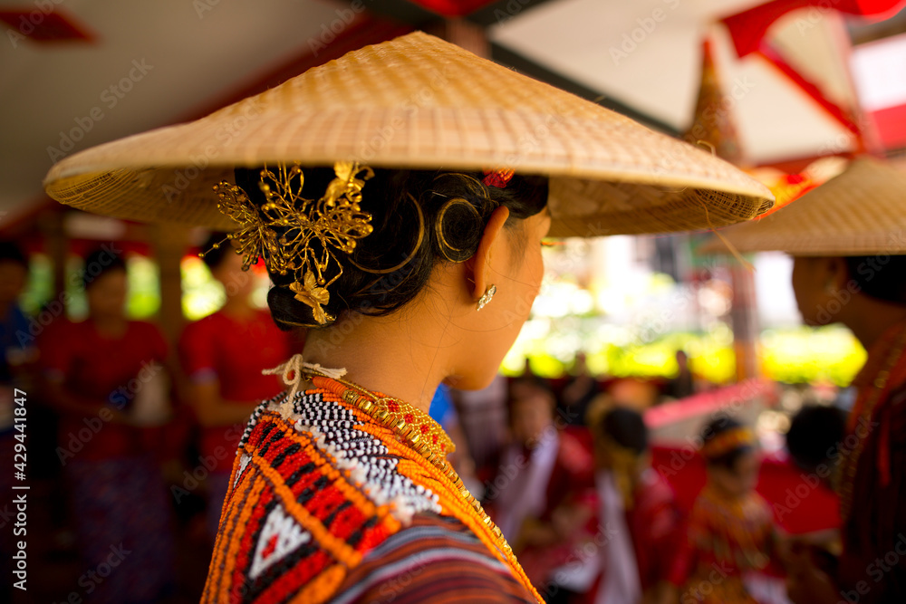 Women dressed with the traditional clothes in a funeral in Tana Toraja ...