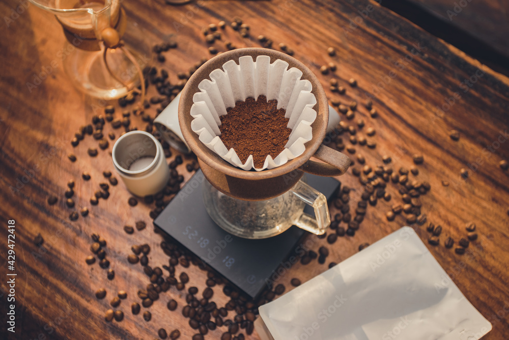Coffee powder in the dripper for make coffee filter on scales. Prepare ...