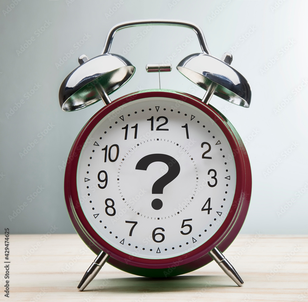 classic old clock with question mark without hands on a white ...